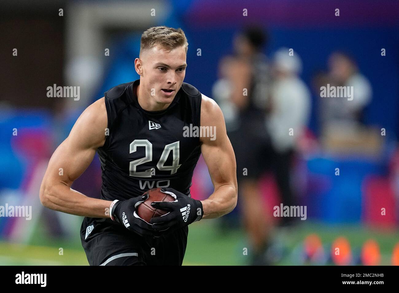 Cincinnati wide receiver Alec Pierce runs a drill during the NFL ...