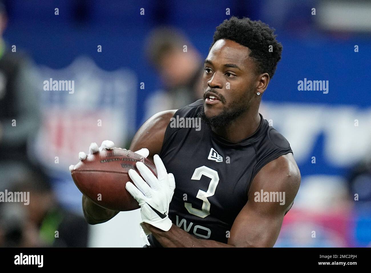 Purdue wide receiver David Bell runs a drill during the NFL football ...