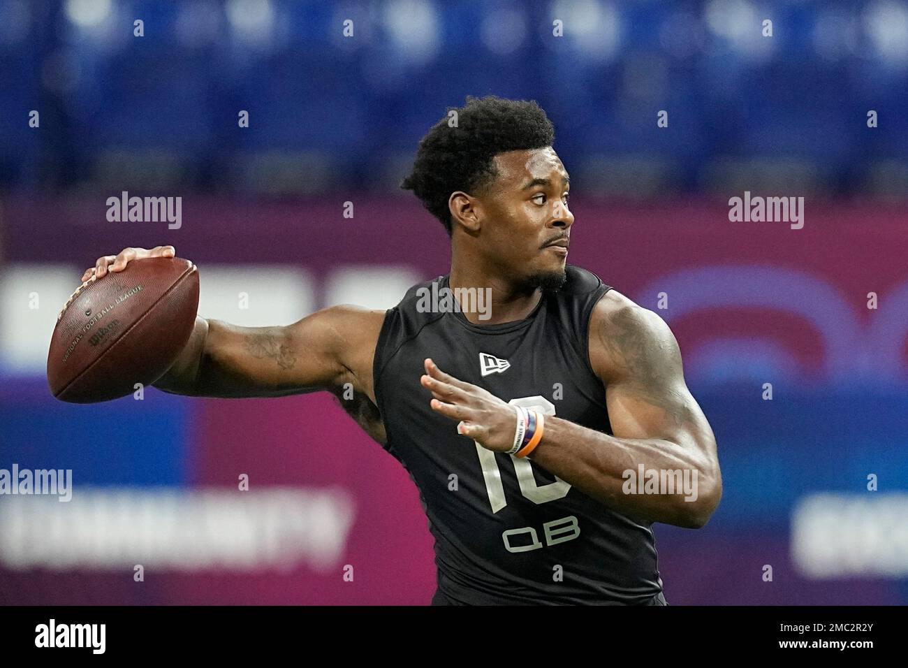 Liberty quarterback Malik Willis runs a drill during the NFL football ...
