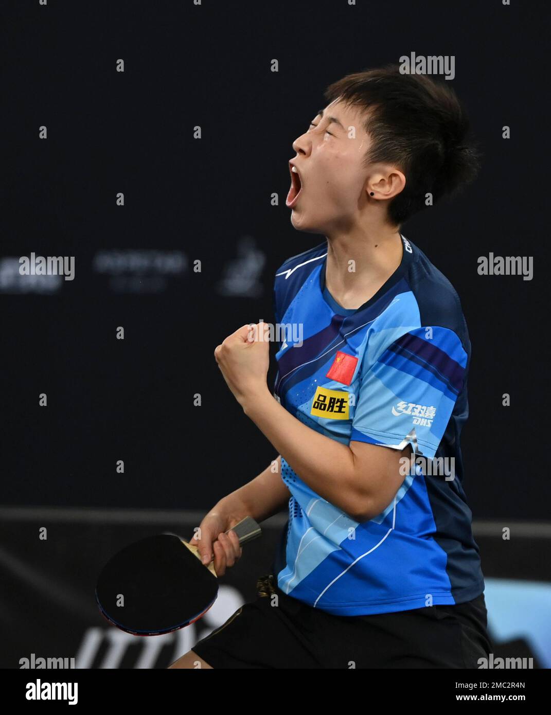 Doha, Qatar. 21st Jan, 2023. Fan Siqi celebrates after winning the ...
