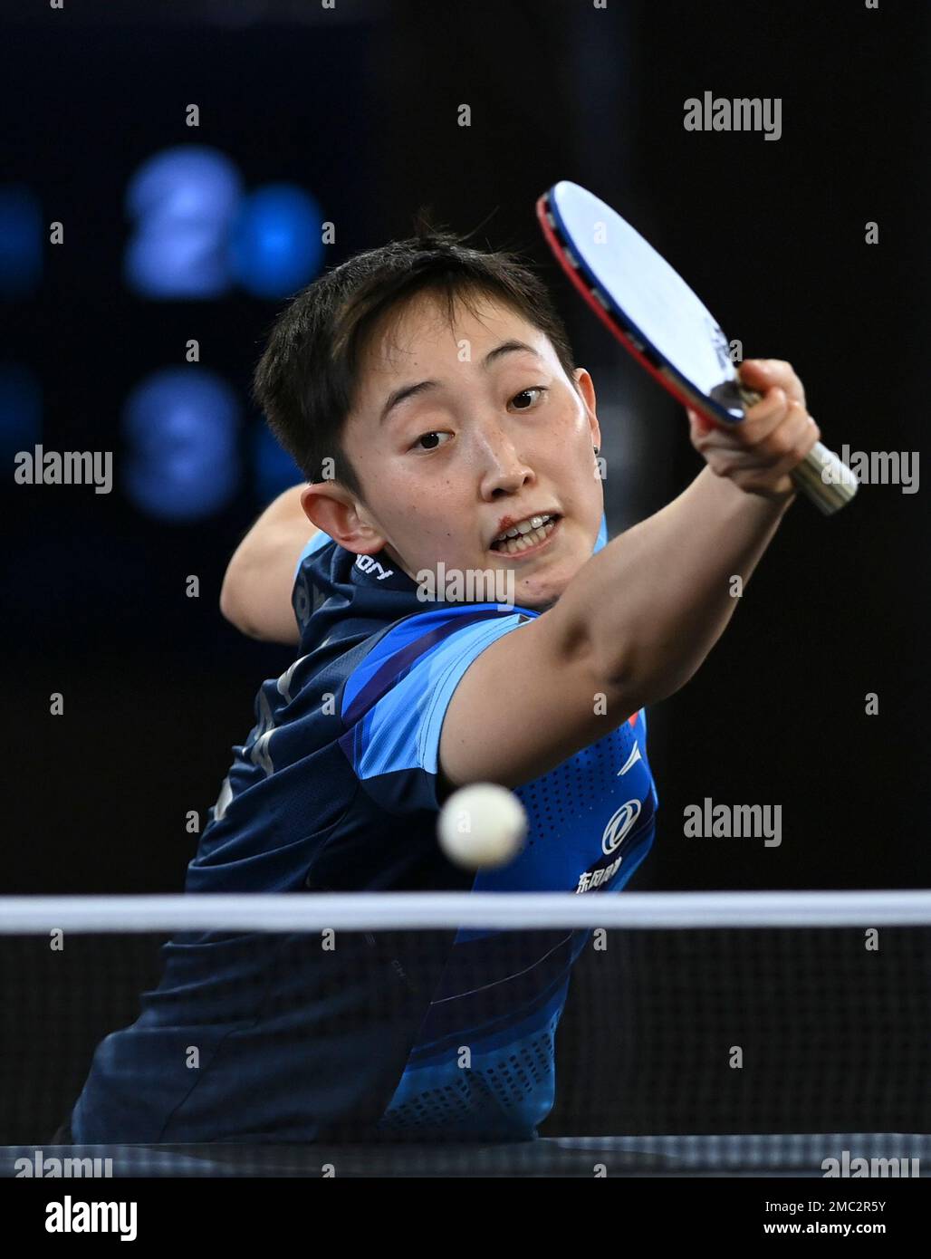 Doha, Qatar. 21st Jan, 2023. Fan Siqi hits a return during the women's ...
