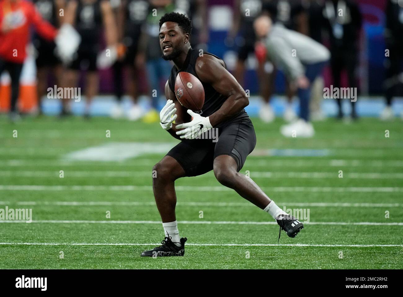 Purdue wide receiver David Bell catches a pass during a drill at the ...