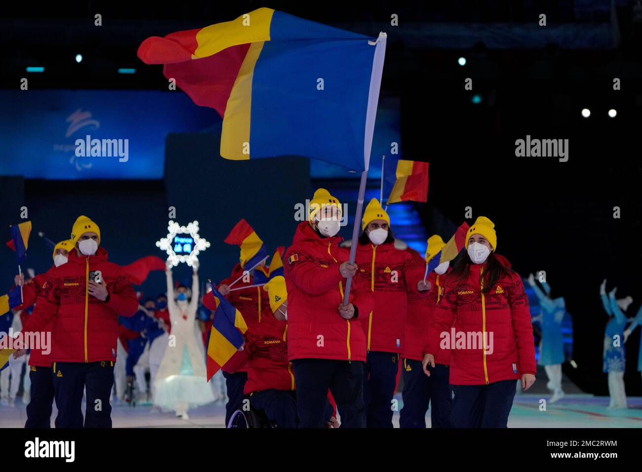 Athletes from Romania arrive for the opening ceremony at the 2022 ...