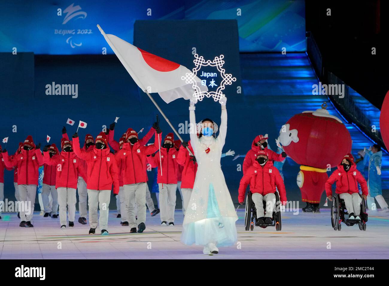 Athletes from Japan arrive at the opening ceremony at the 2022 Winter ...