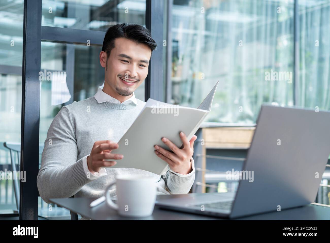 A young business man at work Stock Photo - Alamy