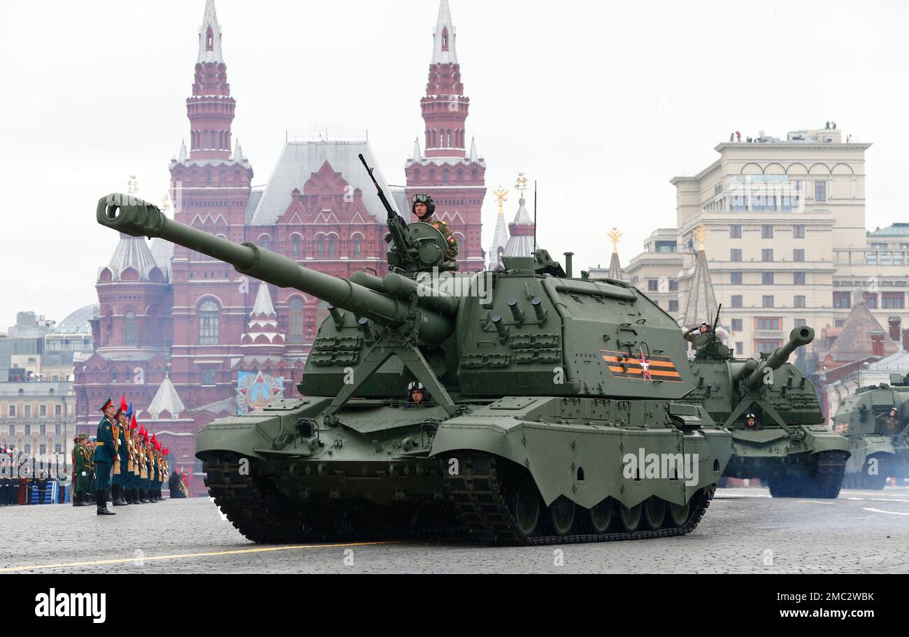 FILE - Russian 2S35 Koalitsiya-SV self-propelled howitzers roll toward ...