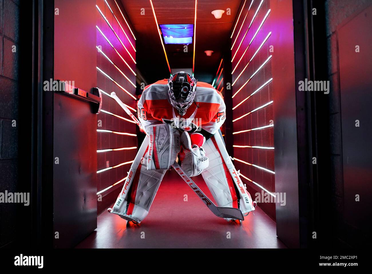 Philadelphia Flyers' Carter Hart waits before an NHL hockey game ...
