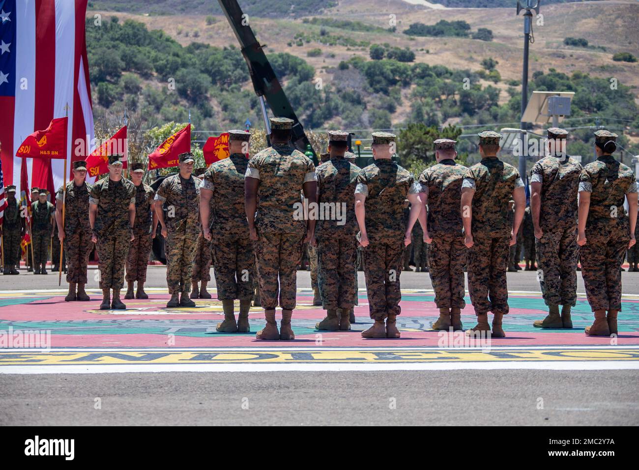 U.S. Marines with the School of Infantry - West, stand at attention ...