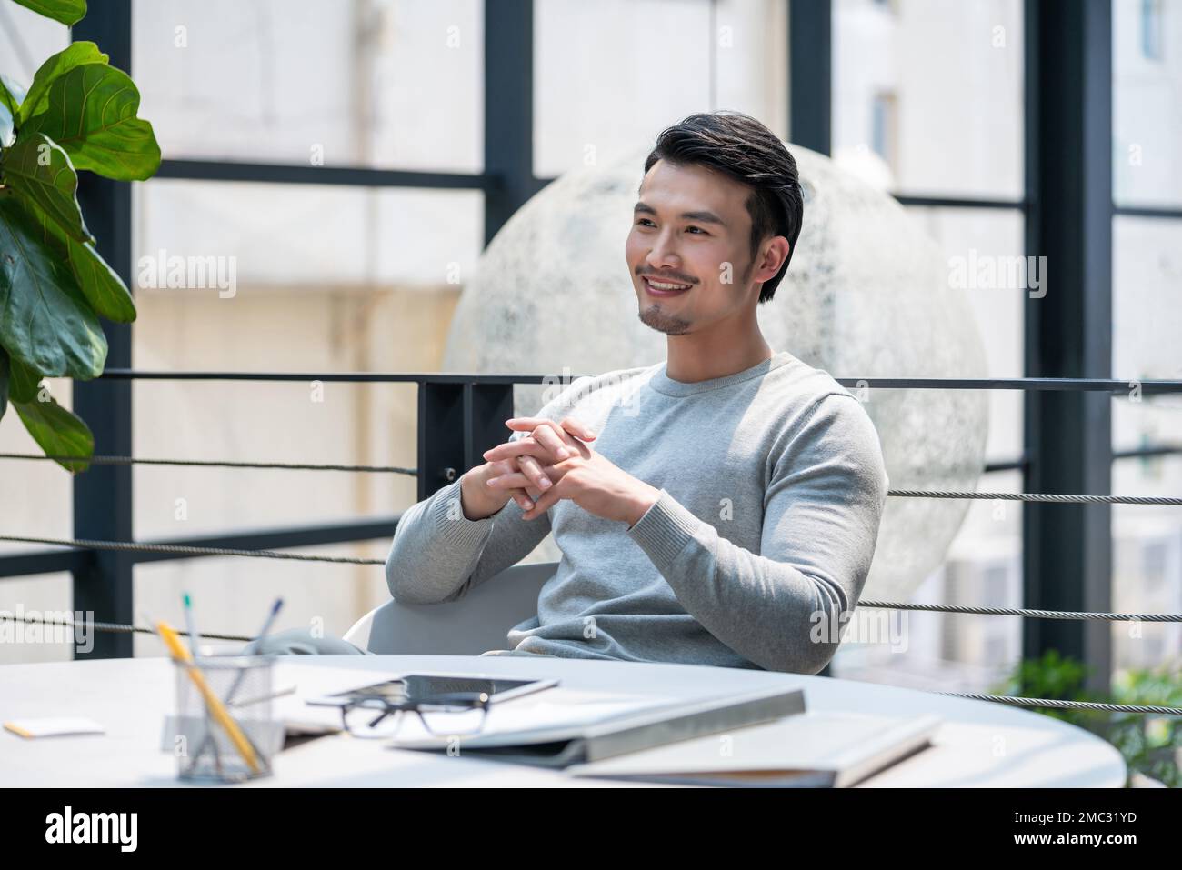 A young business man at work Stock Photo - Alamy