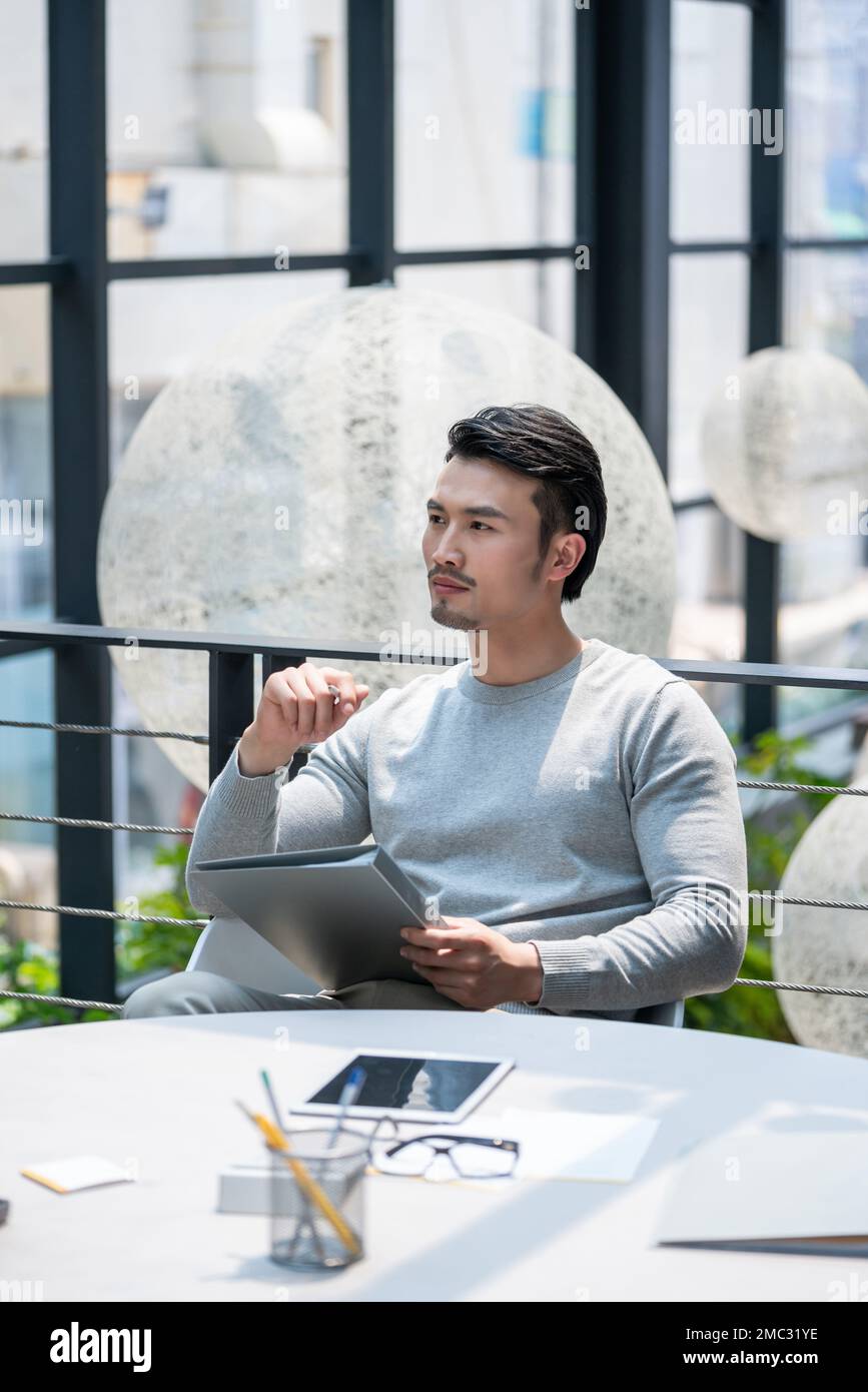 A young business man at work Stock Photo - Alamy