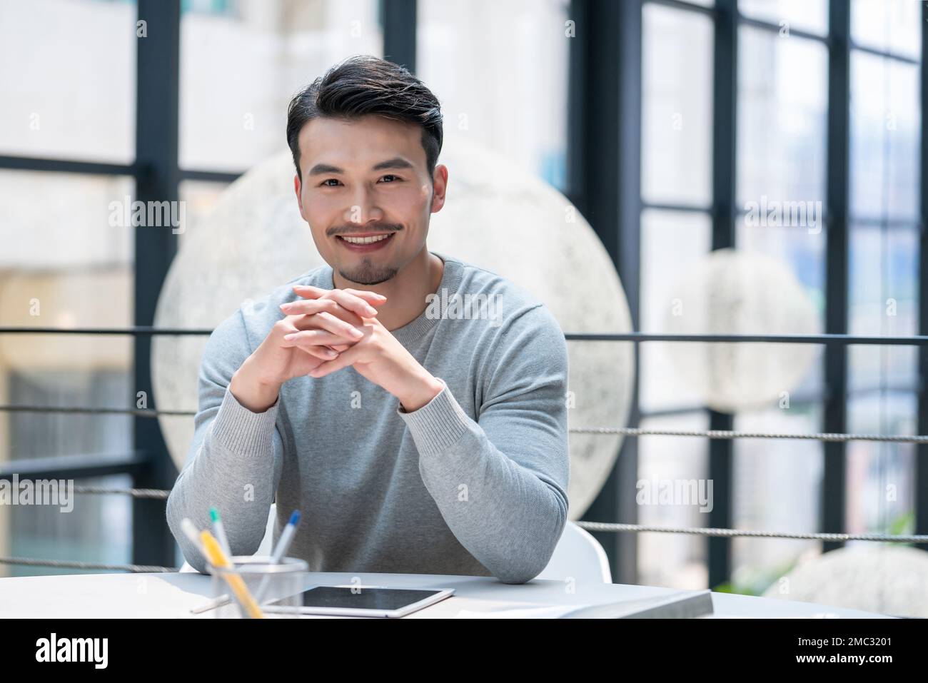 A young business man at work Stock Photo - Alamy