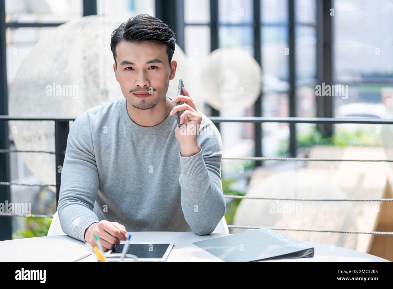 A young business man at work Stock Photo - Alamy