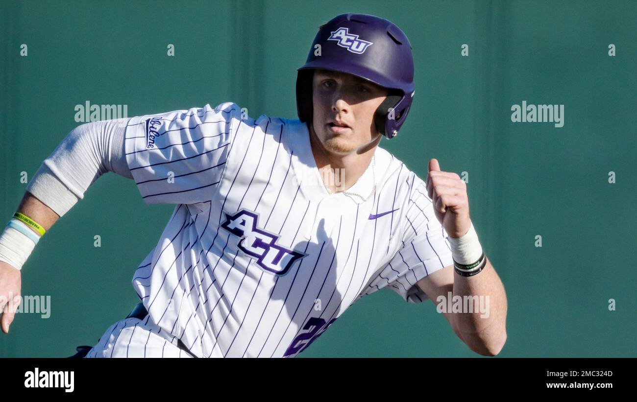 Abilene Christian junior Grayson Tatrow runs to tag up on second during ...