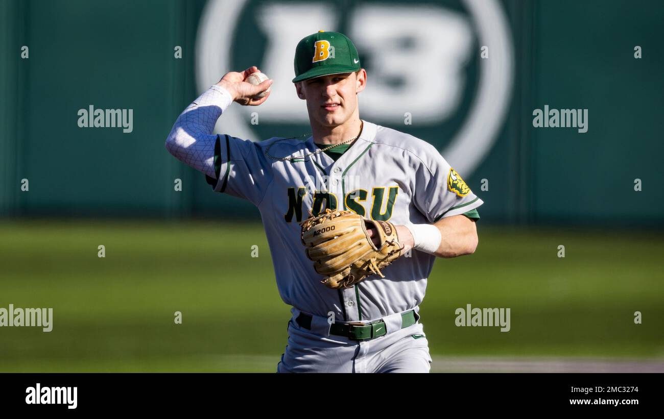 North Dakota St. junior infielder Peter Brookshaw throws during warm ...
