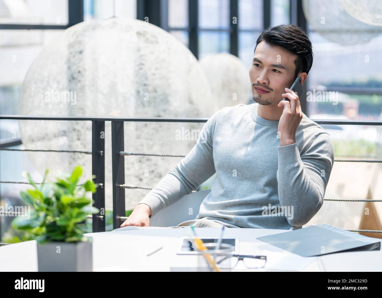 A young business man at work Stock Photo - Alamy