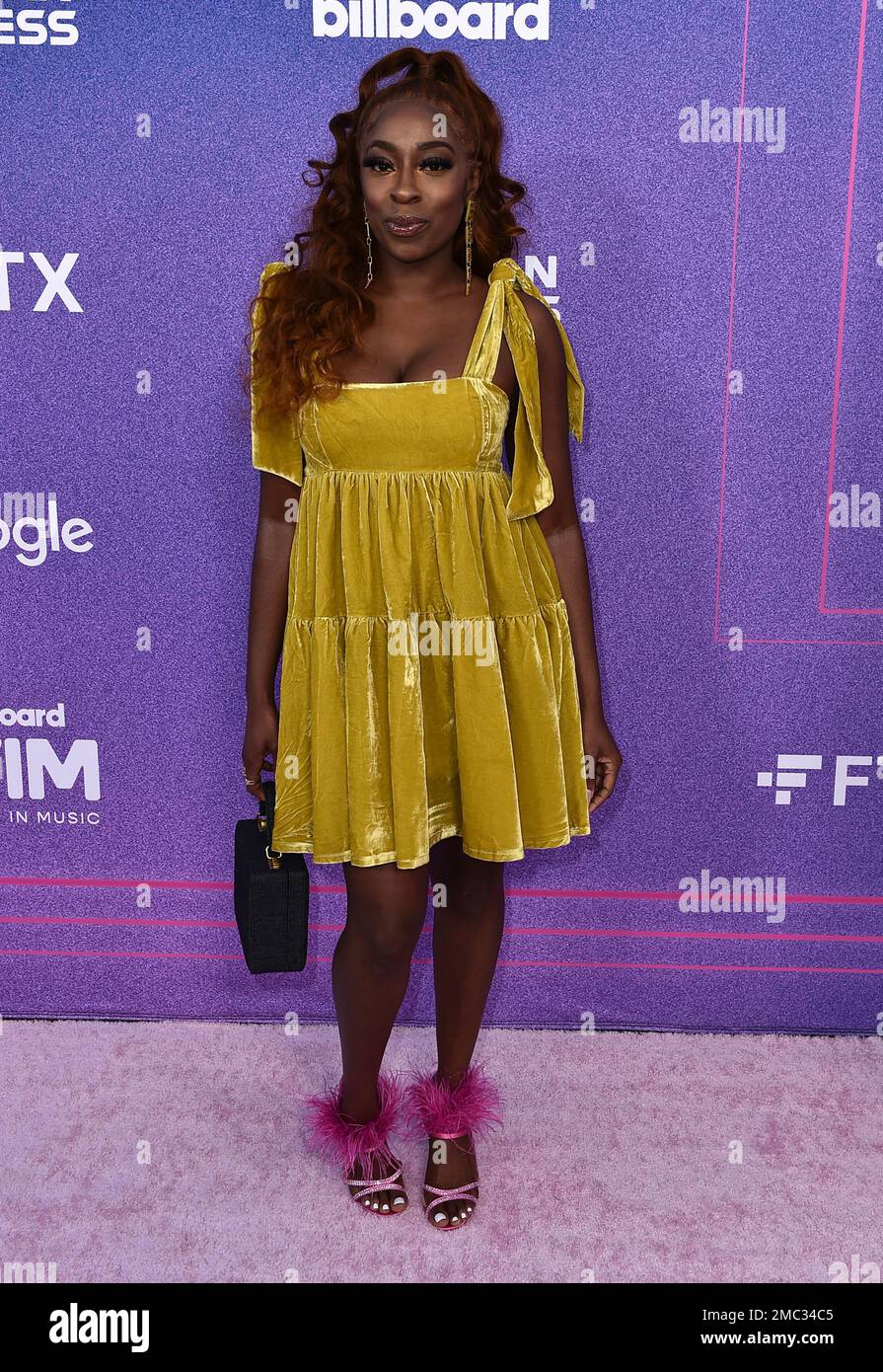 Alicia Gooding arrives at the Billboard Women in Music Awards on ...