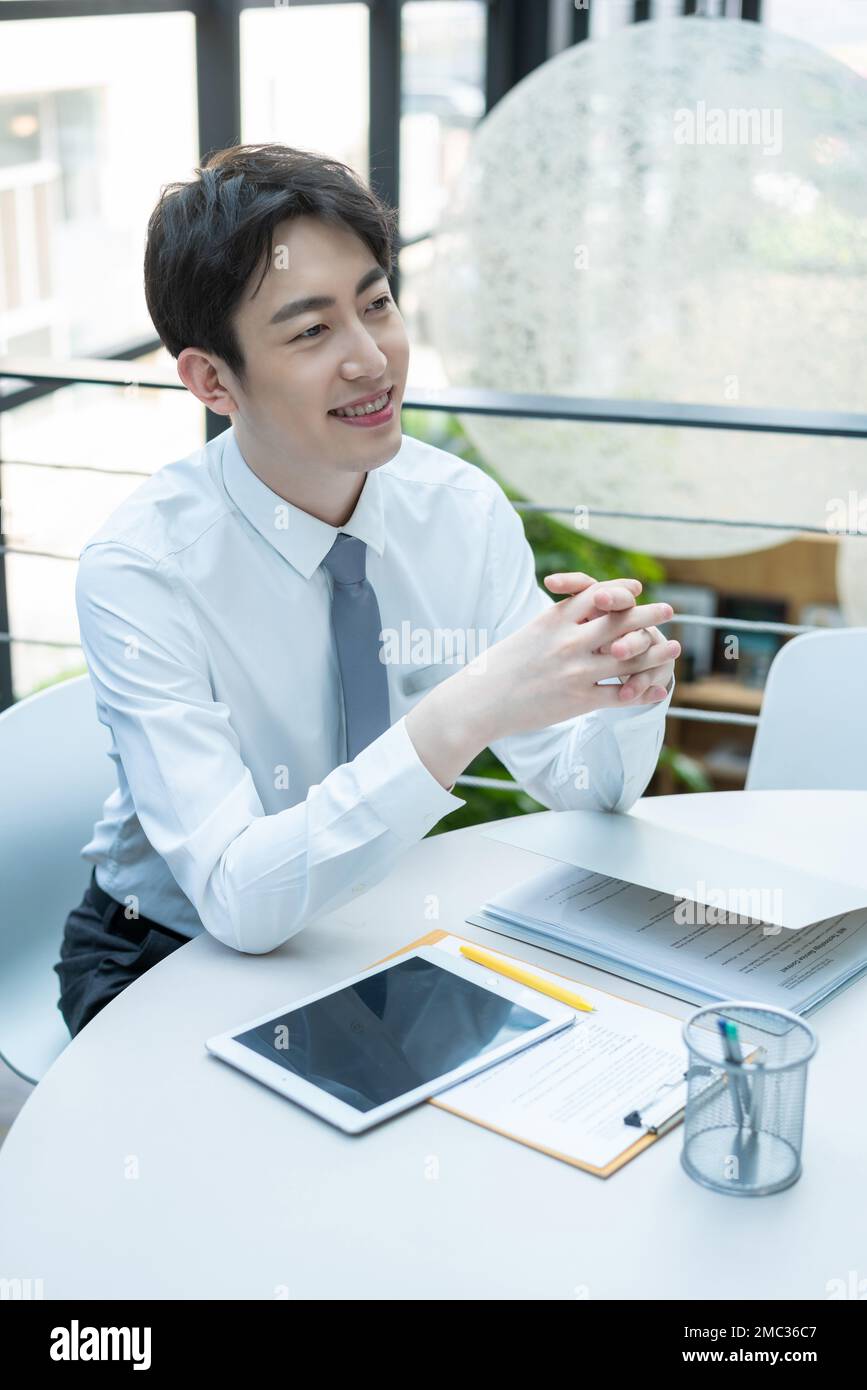 A young business man at work Stock Photo - Alamy