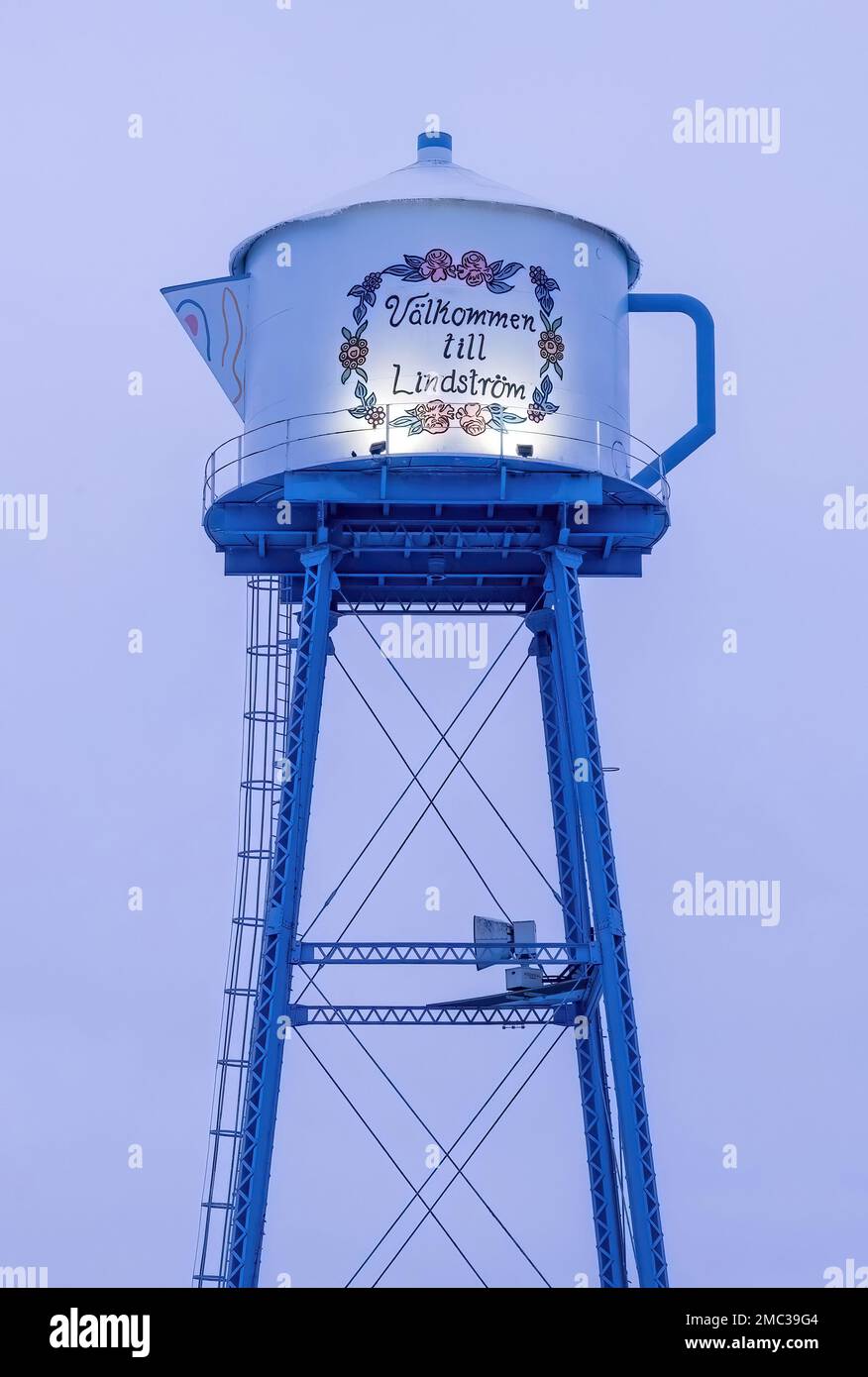Water tower shaped like a coffee pot that says Valkommen till Lindstrom ...