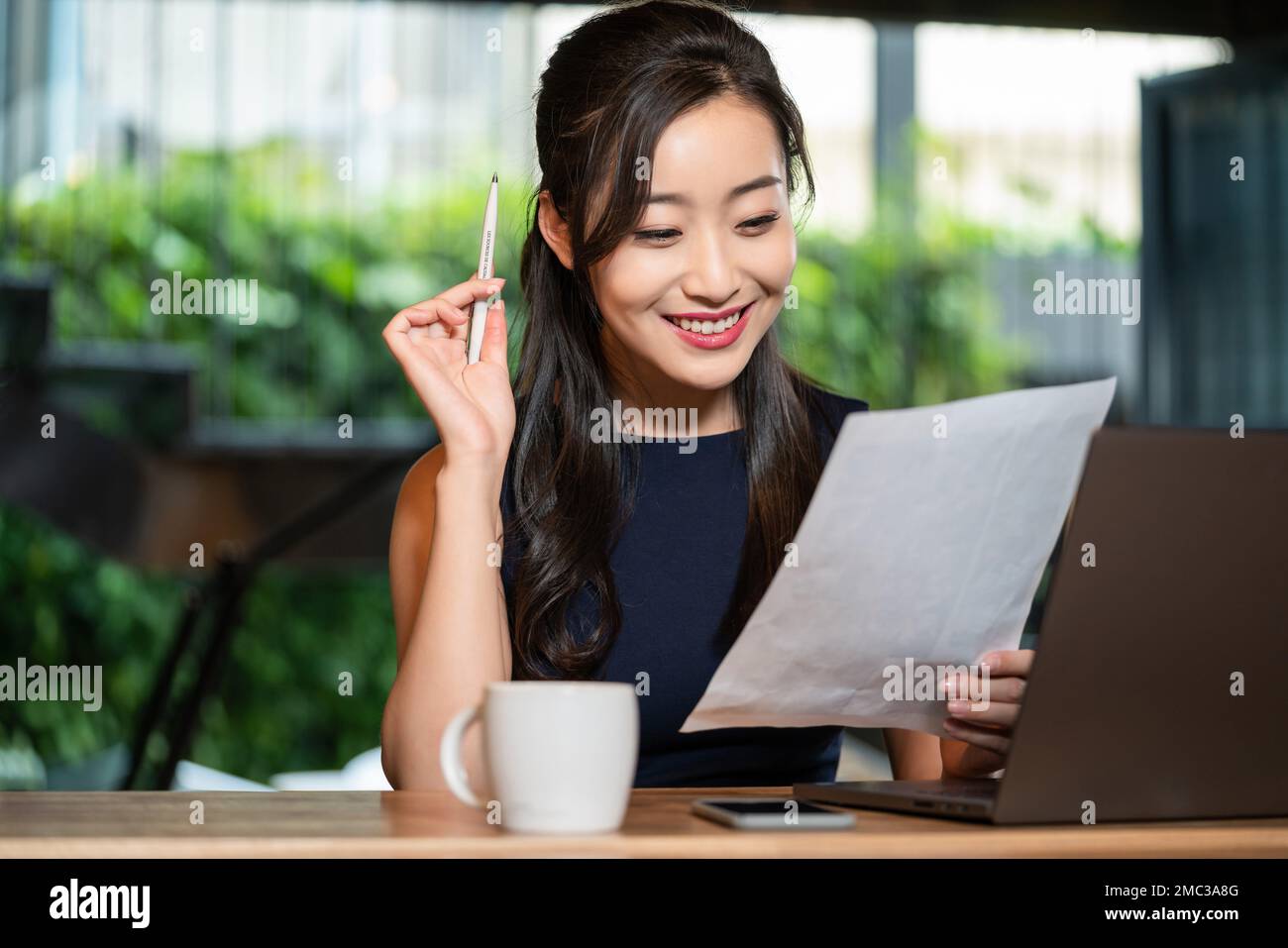 A young woman use the computer Stock Photo - Alamy