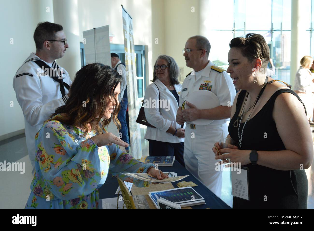 MMA1(SS) George Horning, assigned the Historic Ship Nautilus, interacts ...