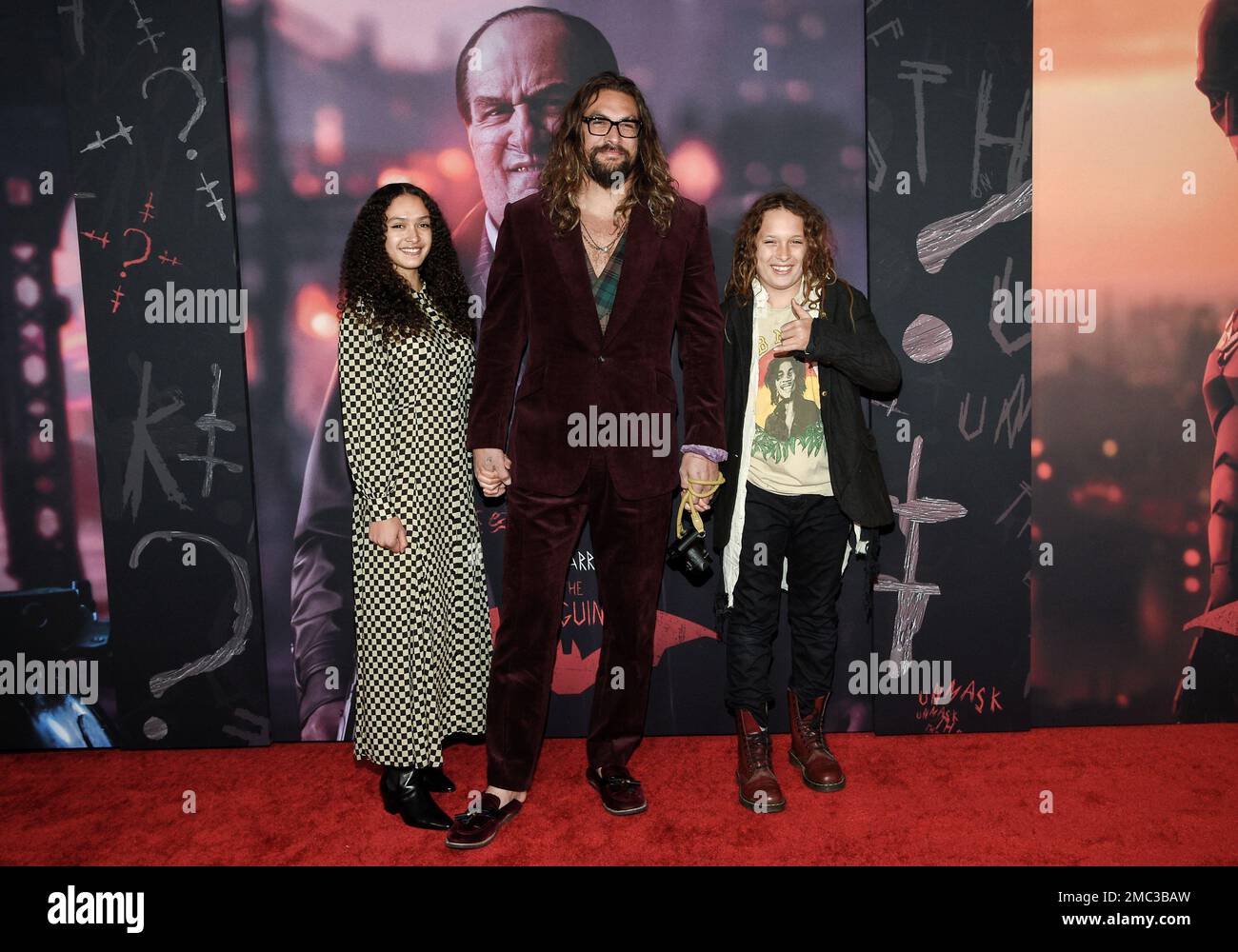 Jason Momoa, center, and his children Lola Iolani Momoa, left, and ...