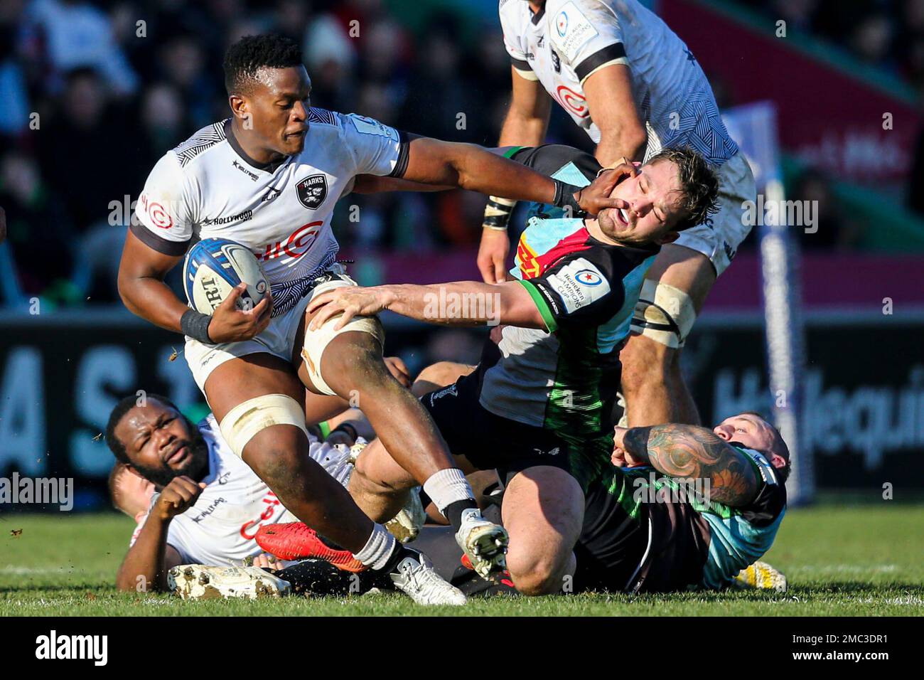 Cell C Sharks' Phepsi Buthelezi with Harlequins' Cadan Murley during ...