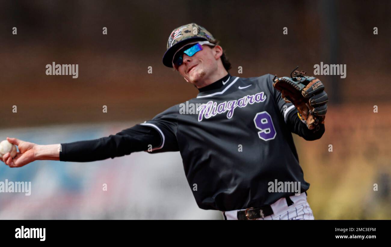 Niagara shortstop Brady Desjardins throws during an NCAA baseball game ...