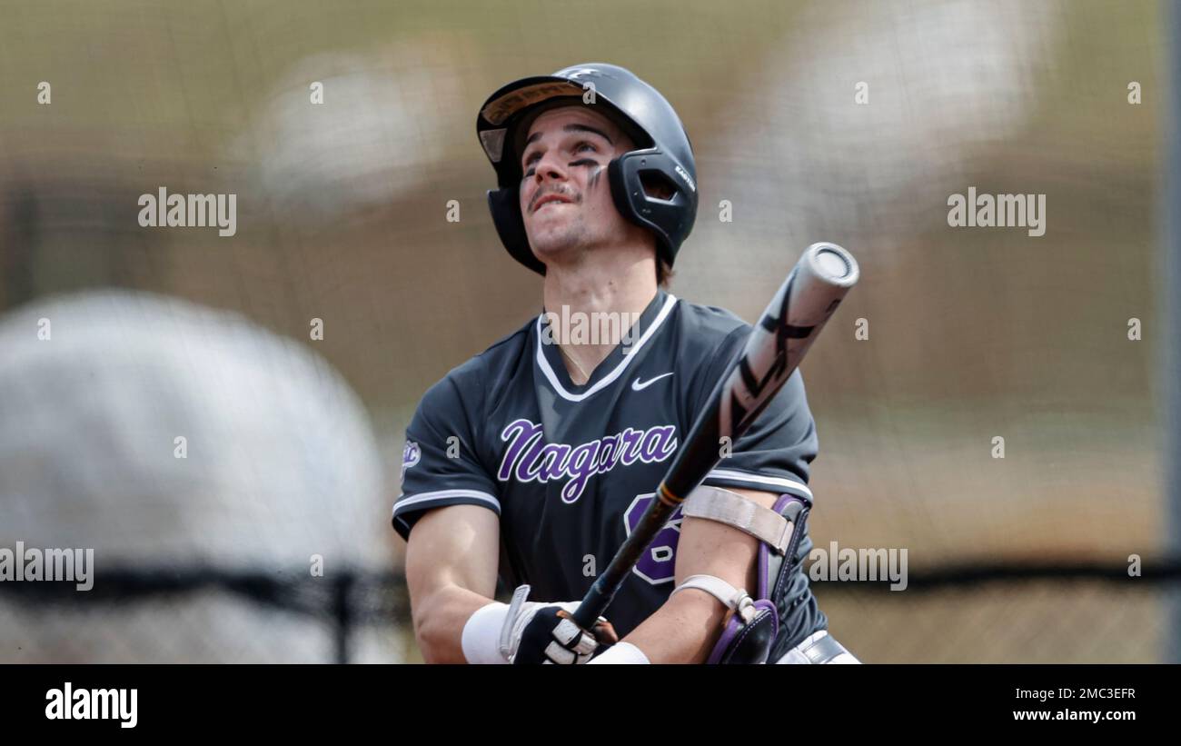 Niagara's Cole Tucker hits against UNC Asheville during an NCAA ...
