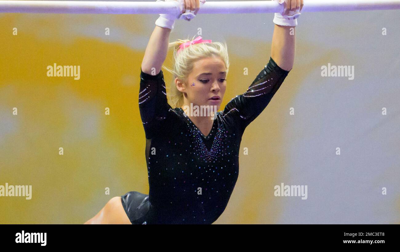 FILE - LSU gymnast Olivia "Livvy" Dunne performs on the uneven bars ...