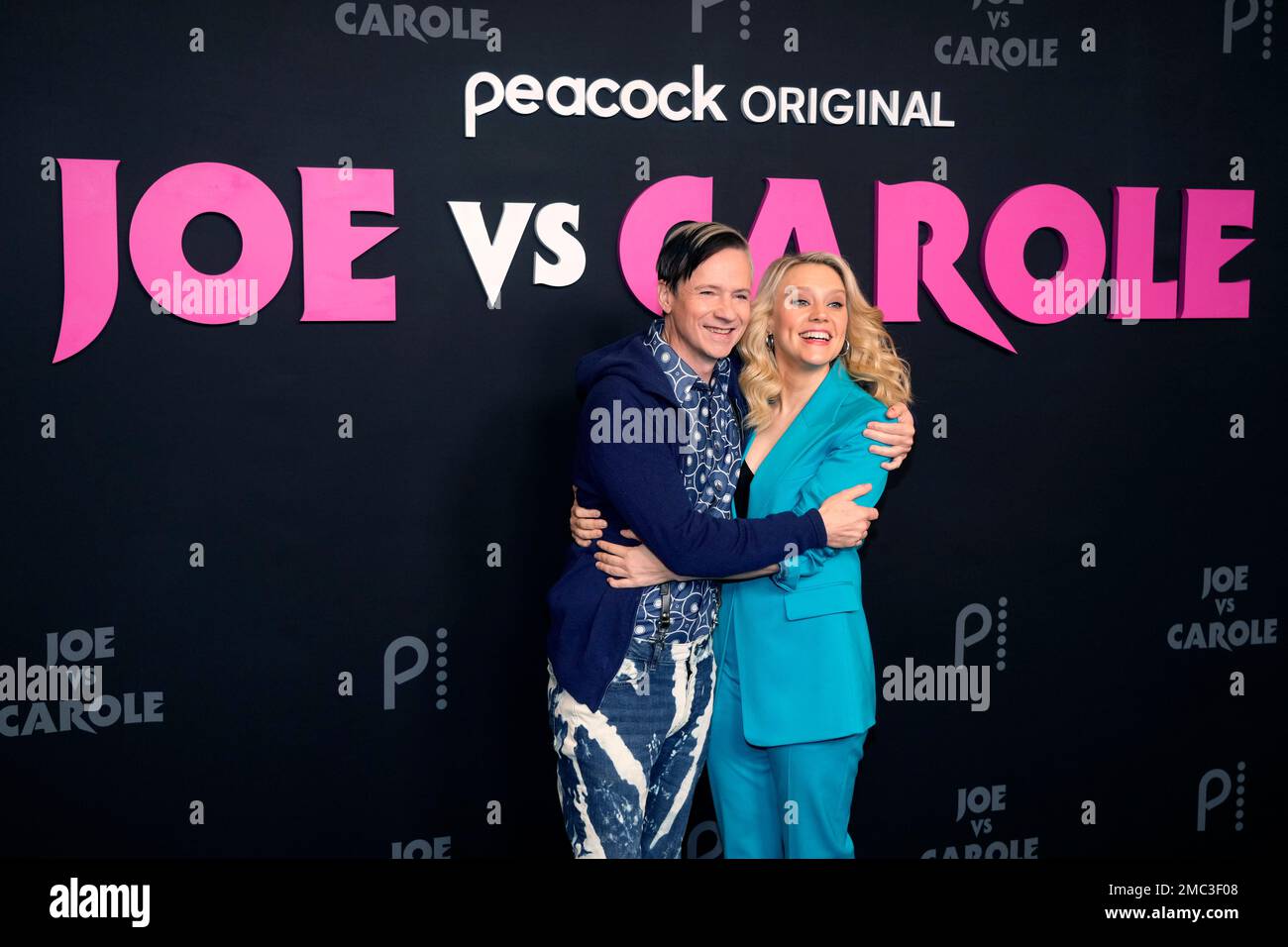 John Cameron Mitchell and Kate McKinnon pose together at the Peacock ...
