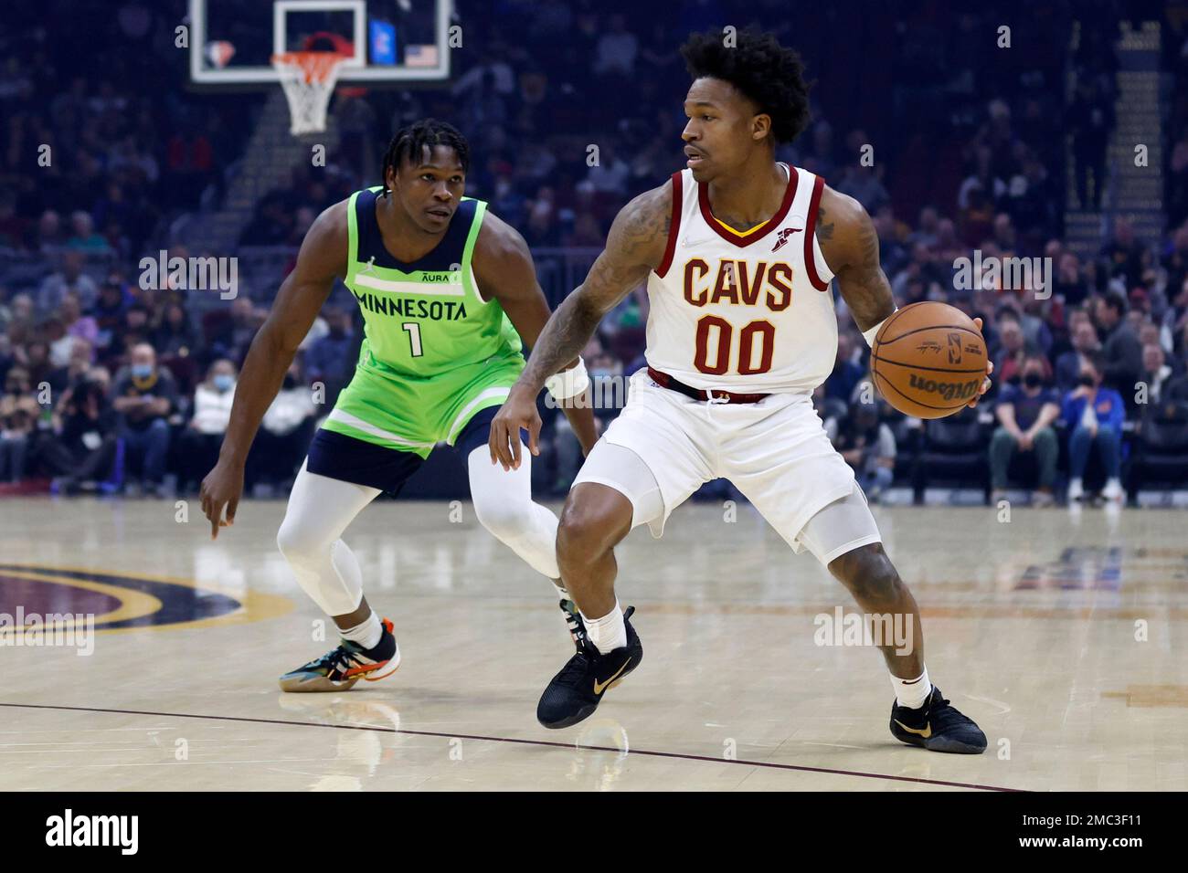Cleveland Cavaliers' Brandon Goodwin (00) plays against Minnesota ...