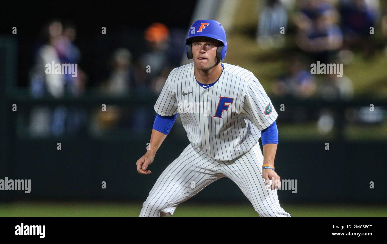 Florida infielder Colby Halter (5) leads off from first during an NCAA ...