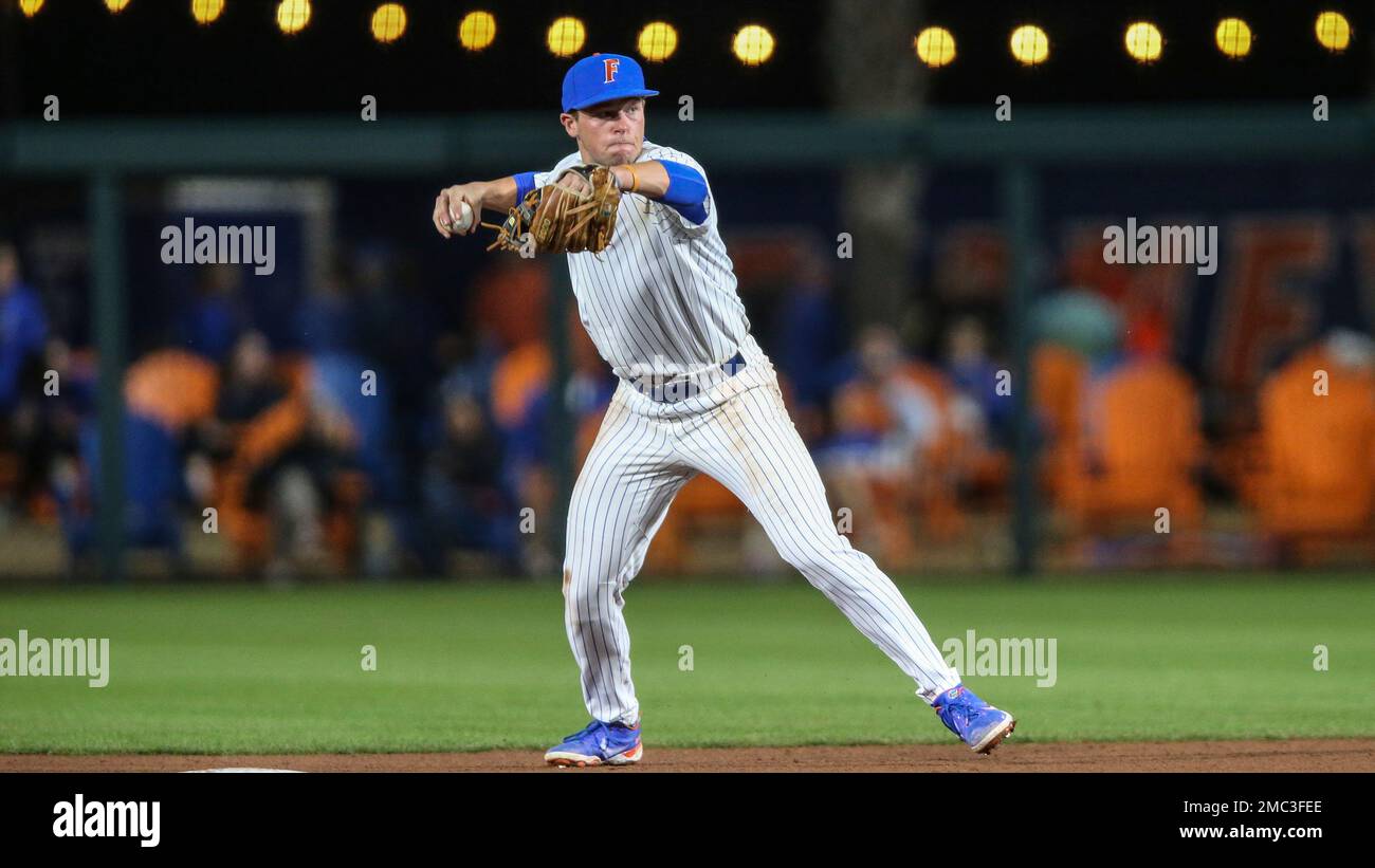 Florida infielder Colby Halter (5) throws to first during an NCAA ...