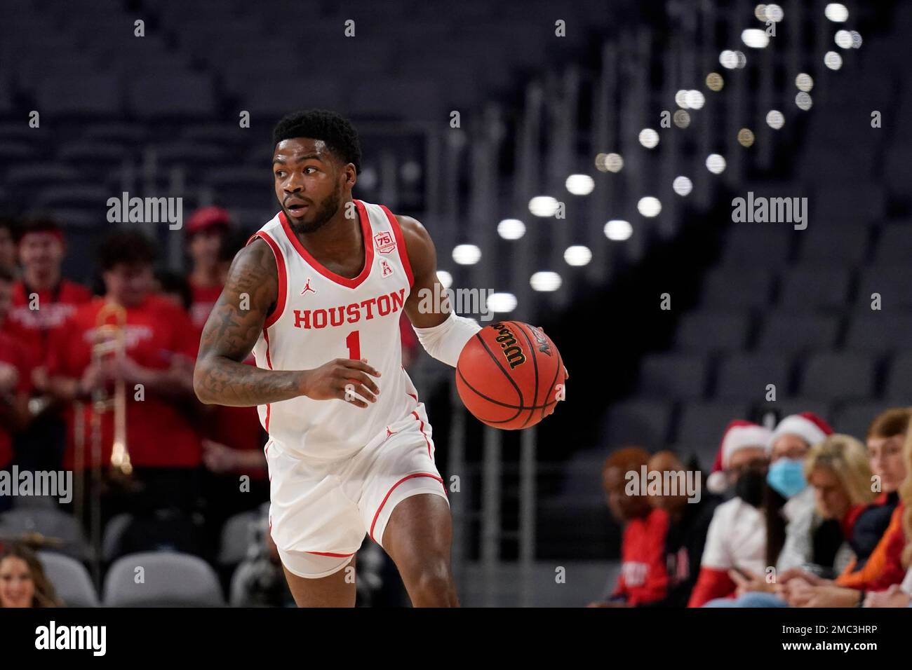 Houston guard Jamal Shead handles the ball during an NCAA college ...