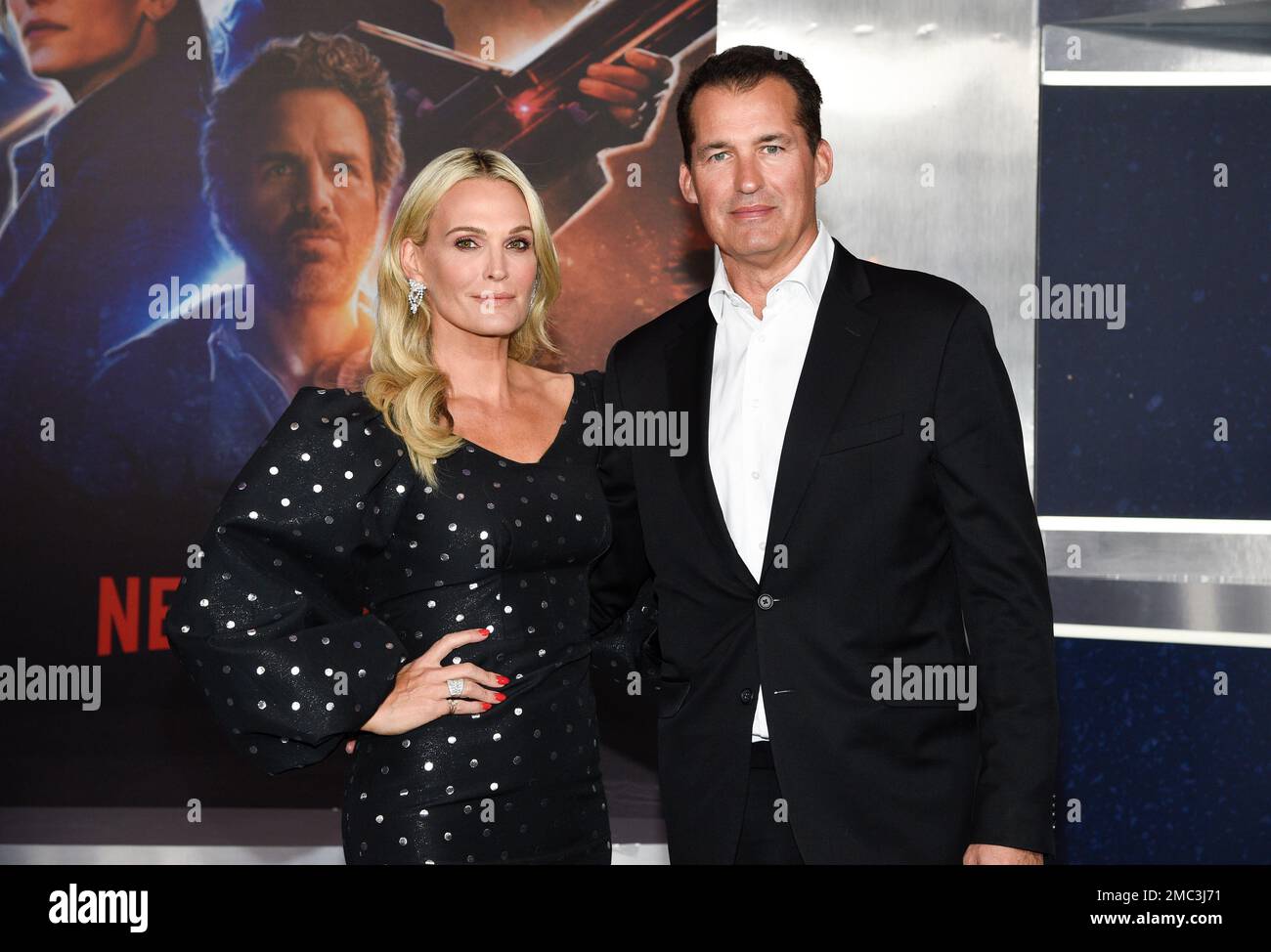 Netflix head of global films Scott Stuber, right, and wife Molly Sims ...