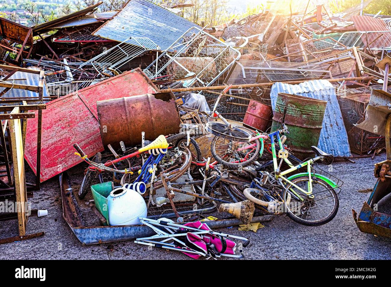 Abandoned outdoor ferrous waste landfill, including nets, drums, and ...
