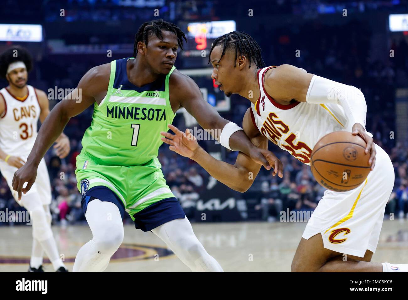 Cleveland Cavaliers' Isaac Okoro (35) drives against Minnesota ...