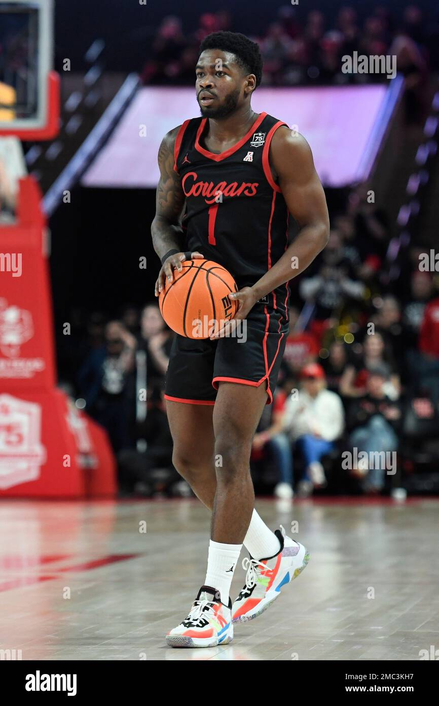 Houston guard Jamal Shead (1) controls the ball against SMU during the ...