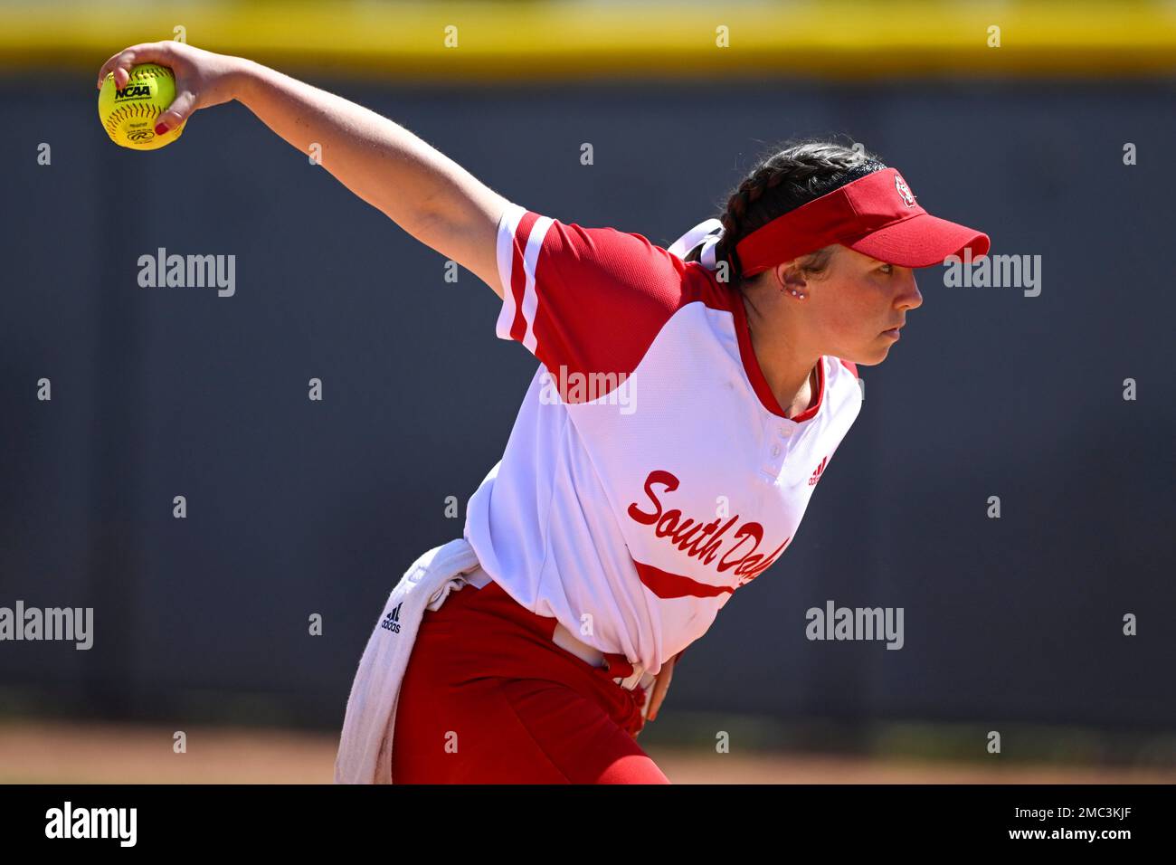 South Dakotas' Holly Fletcher pitches during an NCAA softball game on ...