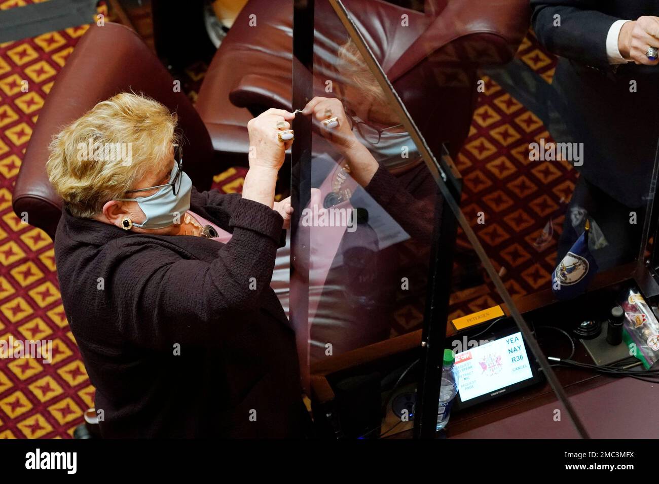 Clerk of the Virginia Senate, Susan Schaar, helps remove COVID-19 ...