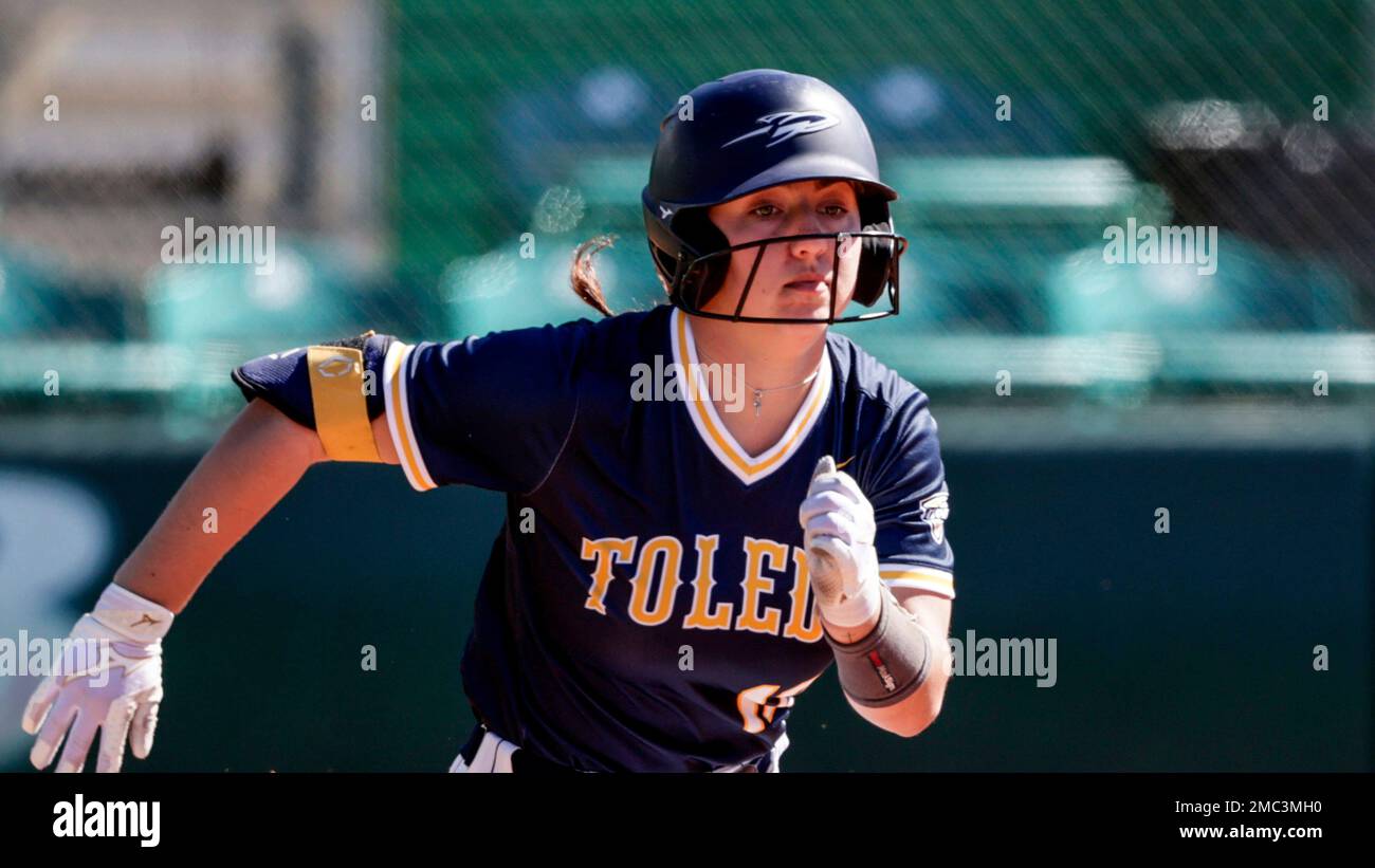 Toledo outfielder Leah Munson (12) runs to first during an NCAA ...