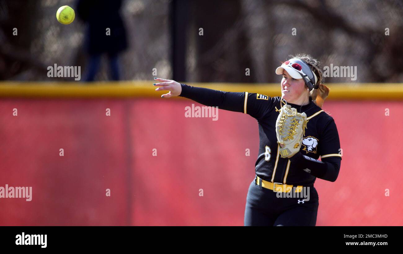UMBC outfielder Meghan Dempsey (6) makes a throw during an NCAA ...