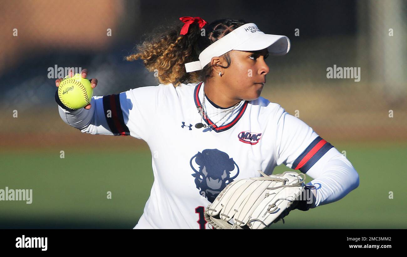 Howard infielder Madison Harris (18) throws during an NCAA softball ...