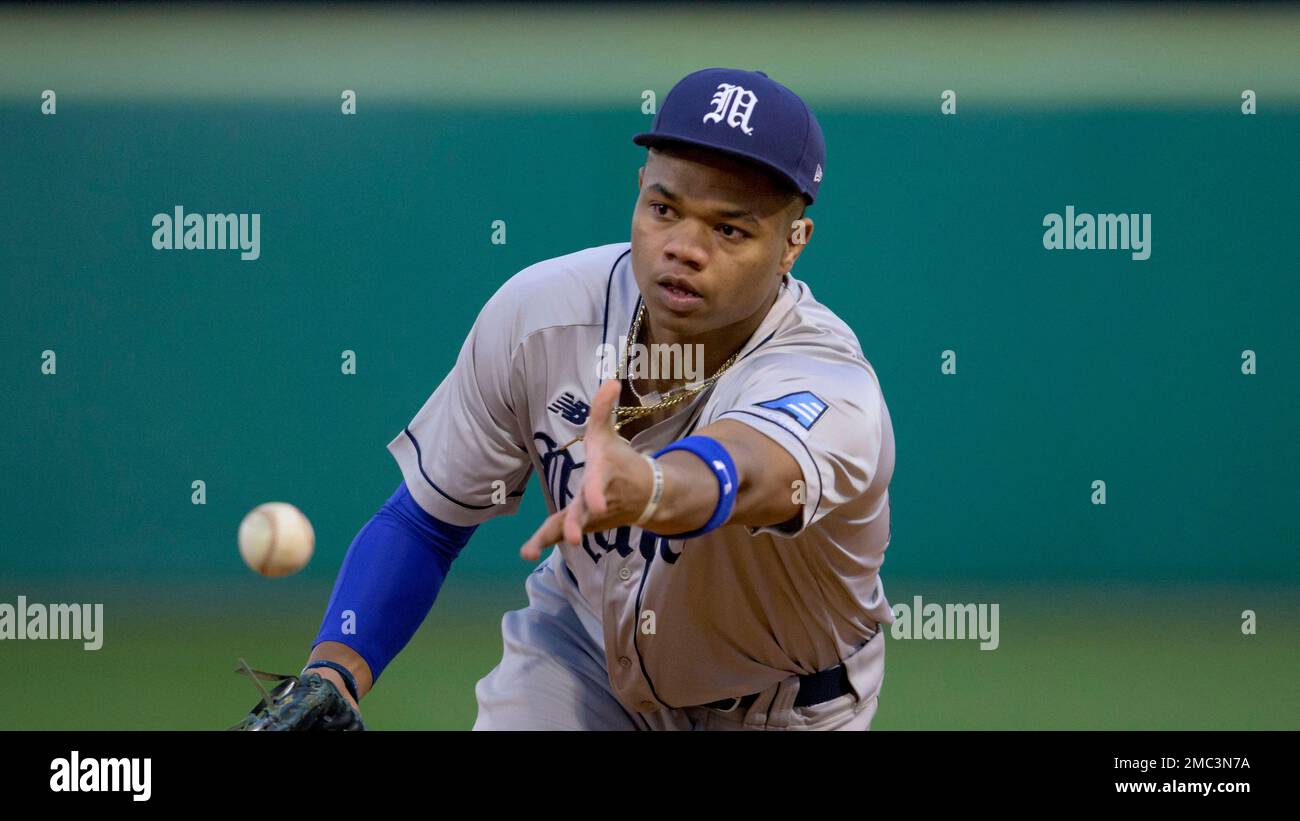 Maine infielder Richie Williams (28) throws during an NCAA baseball ...