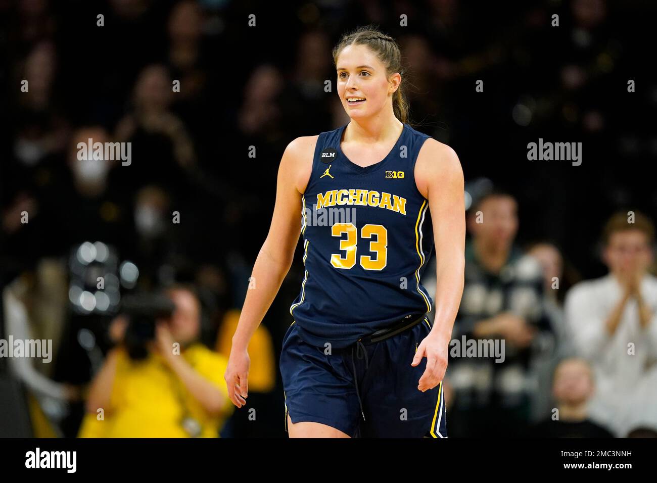 Michigan forward Emily Kiser walks up court during the second half of ...