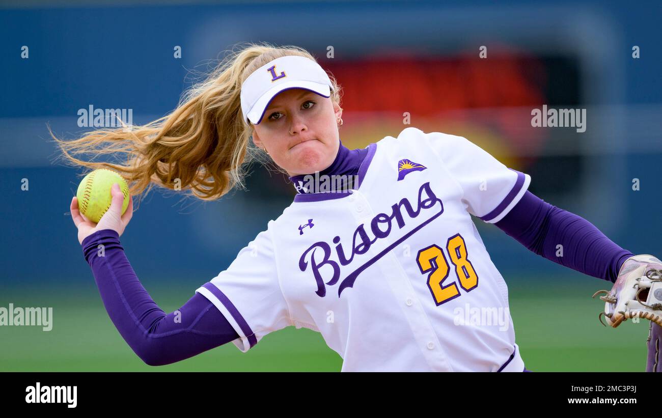Lipscomb infielder Kaitlyn Woodside (28) throws during an NCAA softball ...