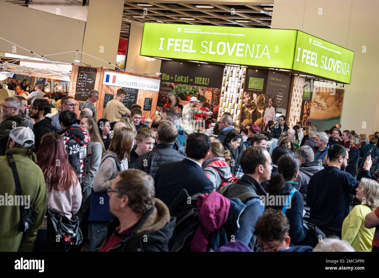 Berlin, Germany. 21st Jan, 2023. Visitors crowd through the hall of ...