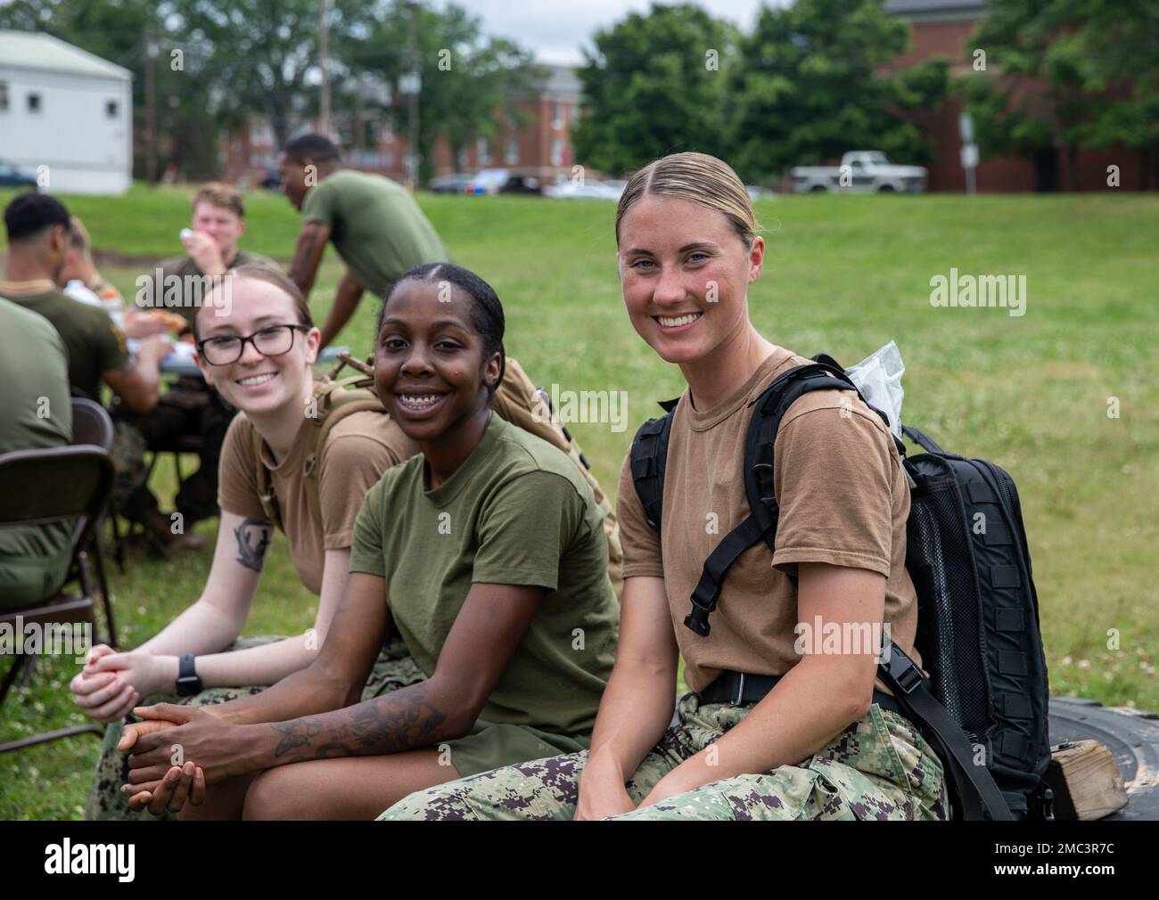 U.S. Marines and Sailors attend a field meet at Butler Stadium on ...