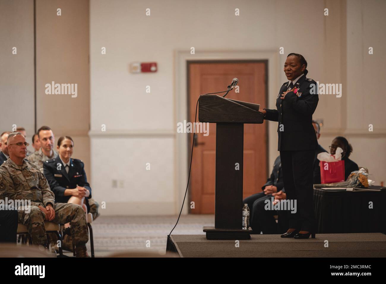 U.S. Air Force Col. Rebecca S. Elliot, 628th Medical Group commander, recognizes the family ...