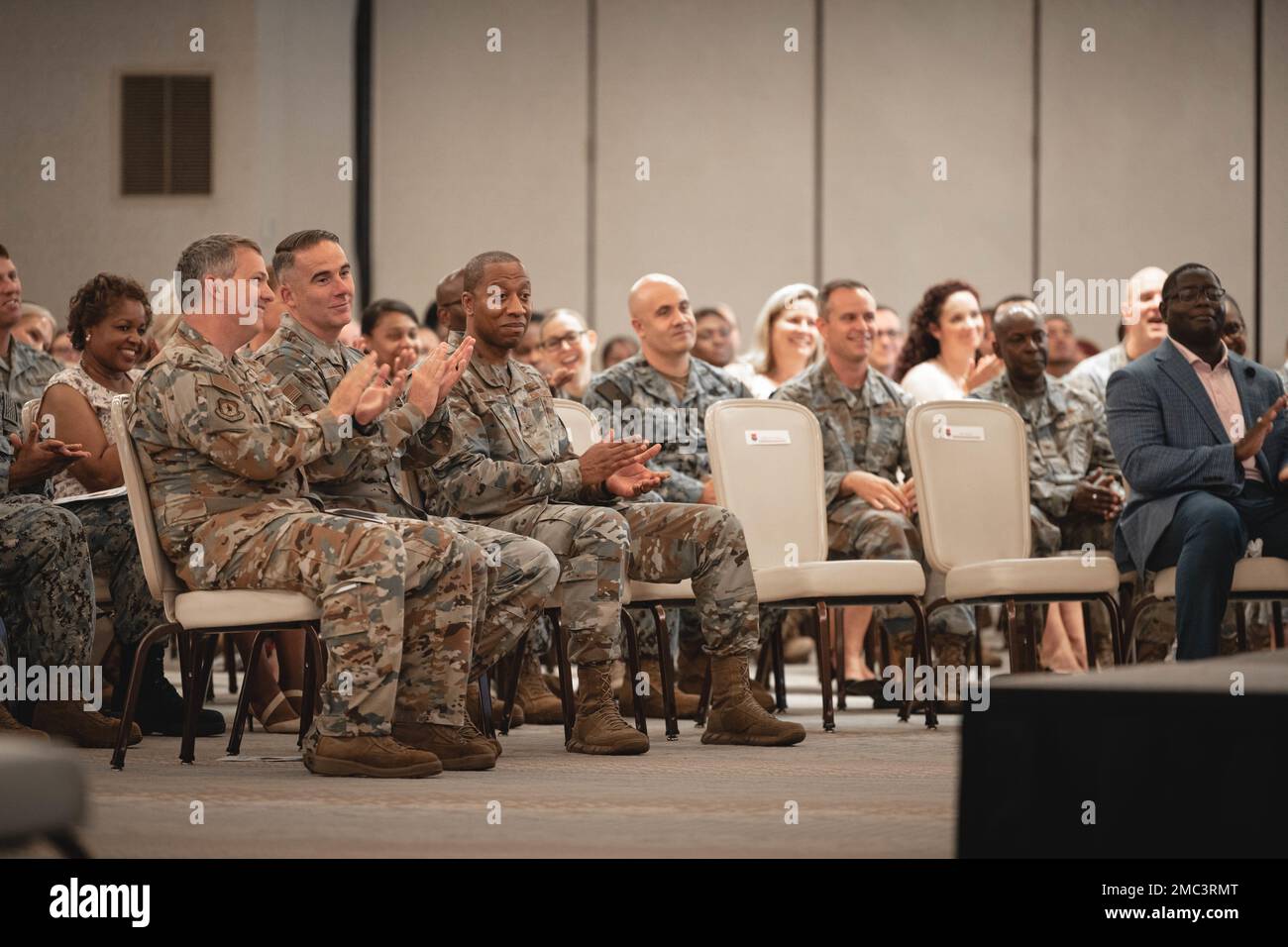 U.S. Air Force, Navy, and civilian counterparts attend the 628th Medical Group change of command ...